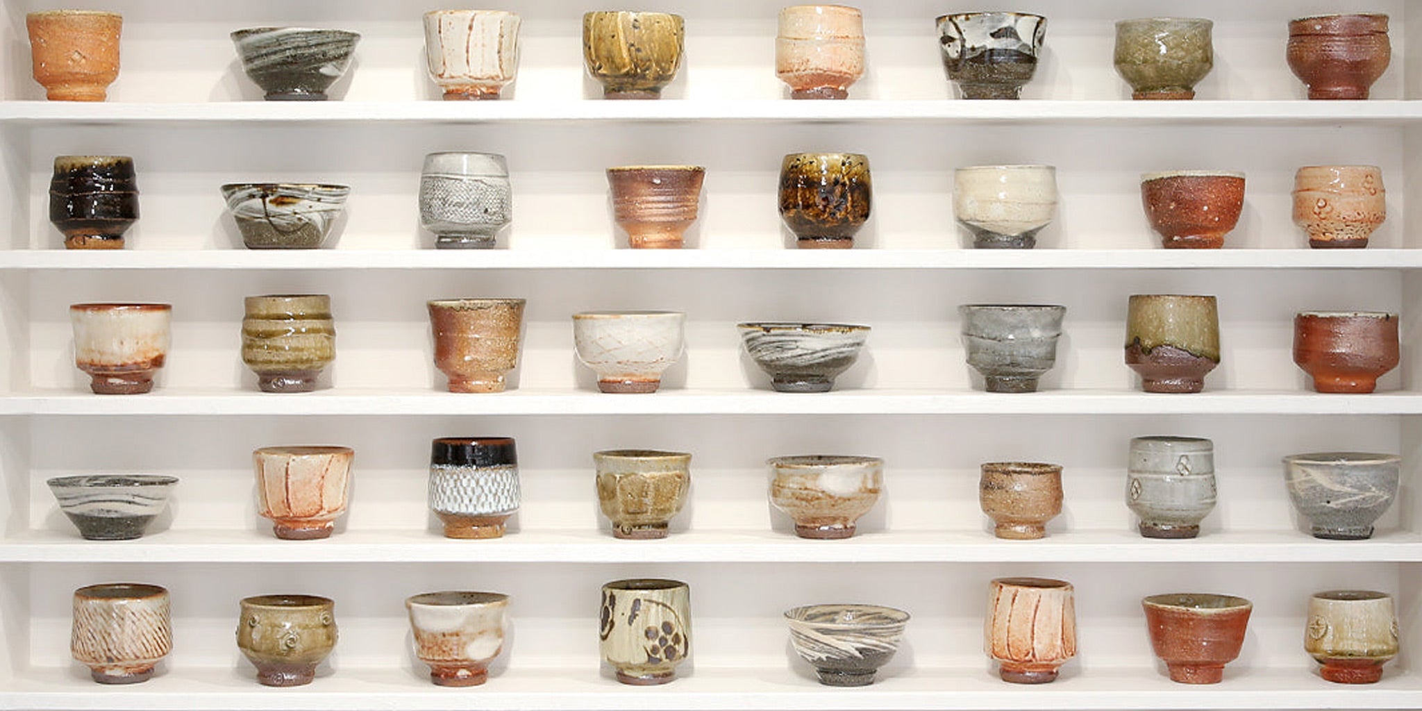 Featured Ceramics | Set of 80 Guinomi by Potter Phil Rogers – Goldmark